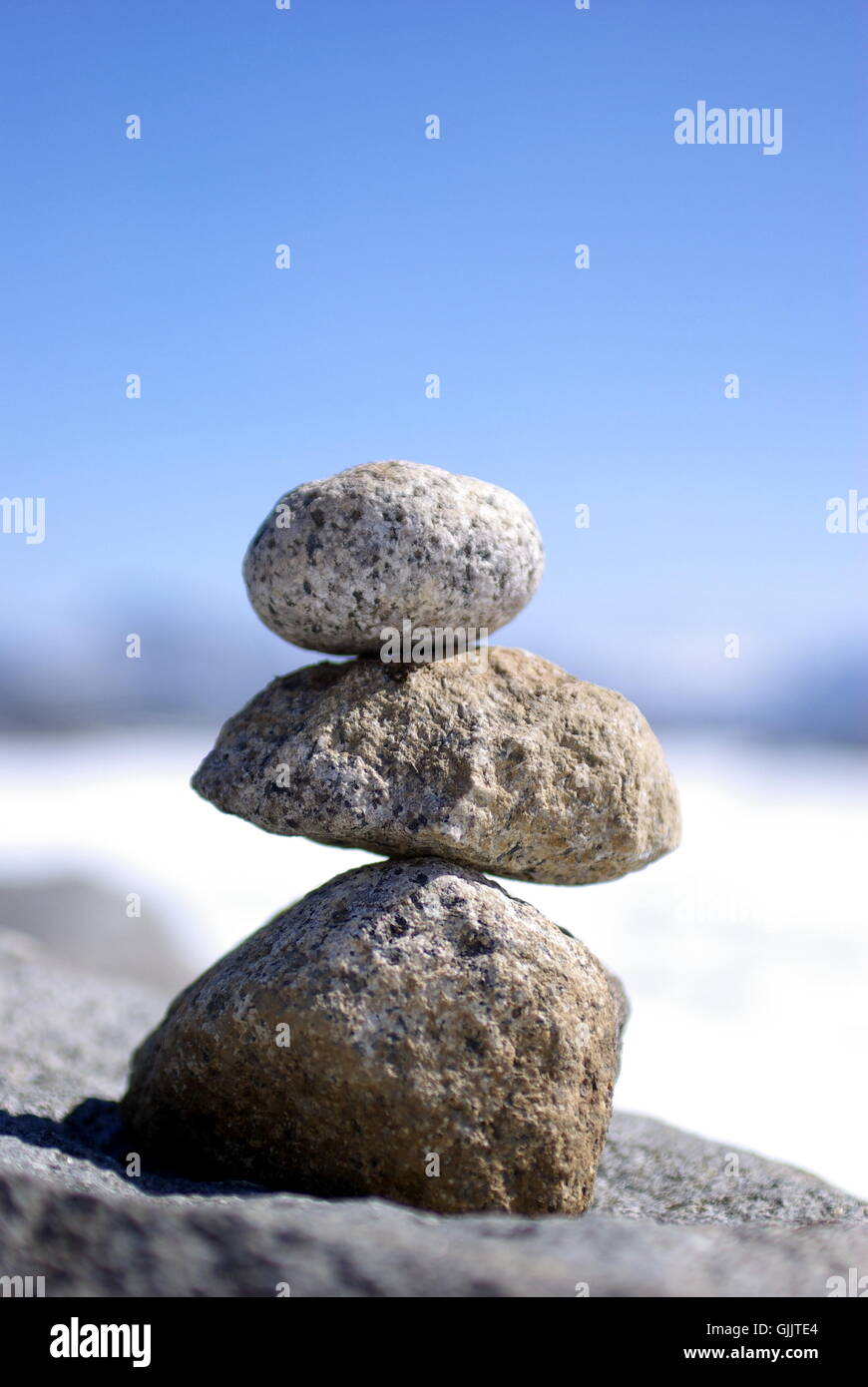 Three stacked stones hi-res stock photography and images - Alamy