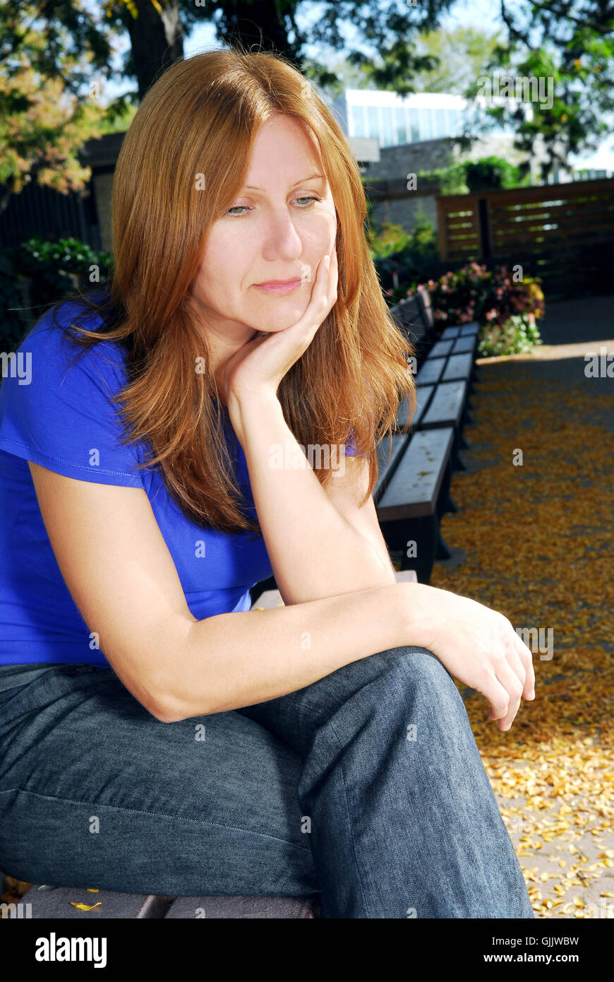 Woman thoughtful sad outdoor hi-res stock photography and images - Alamy