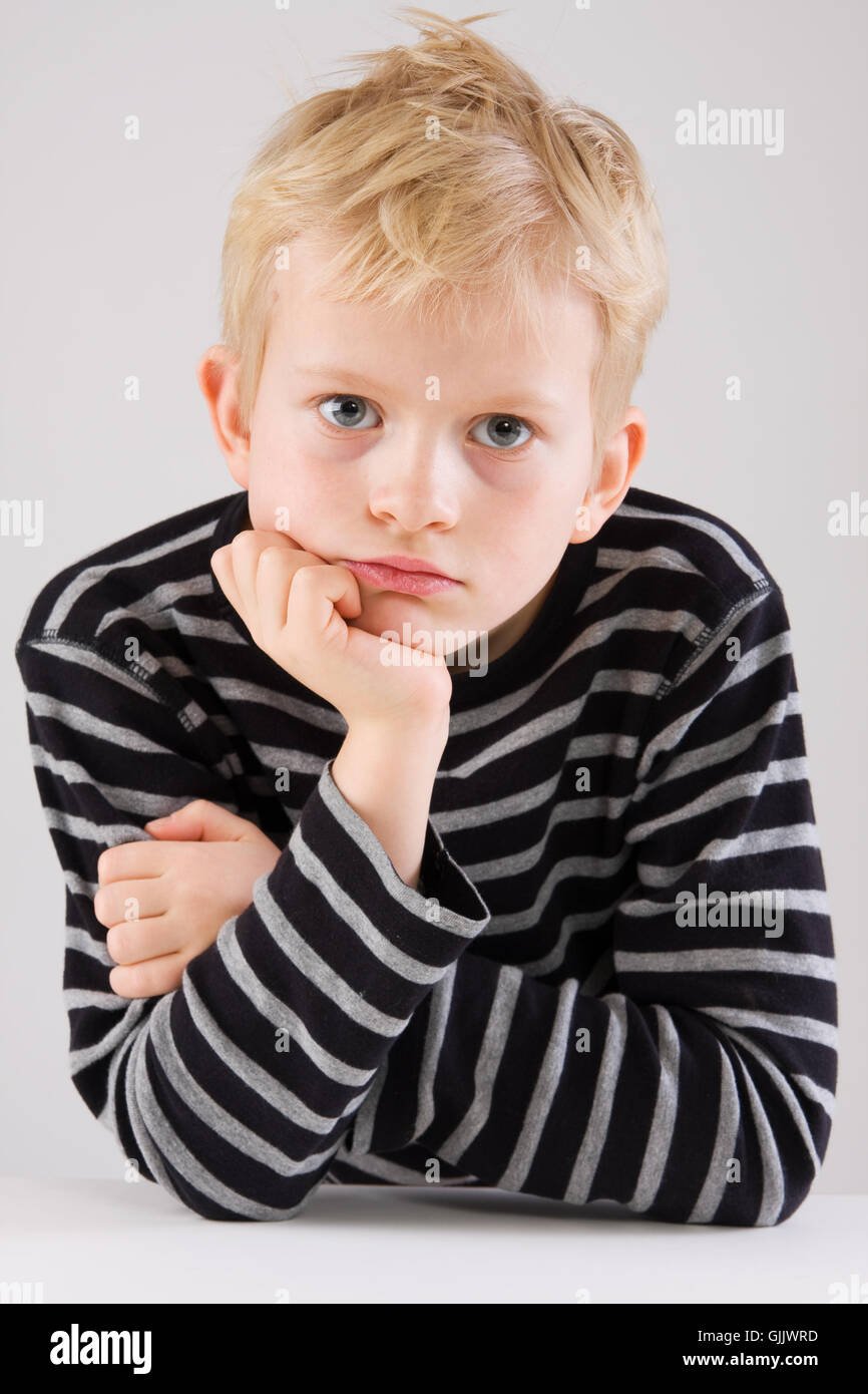 Small boy being sad hi-res stock photography and images - Alamy