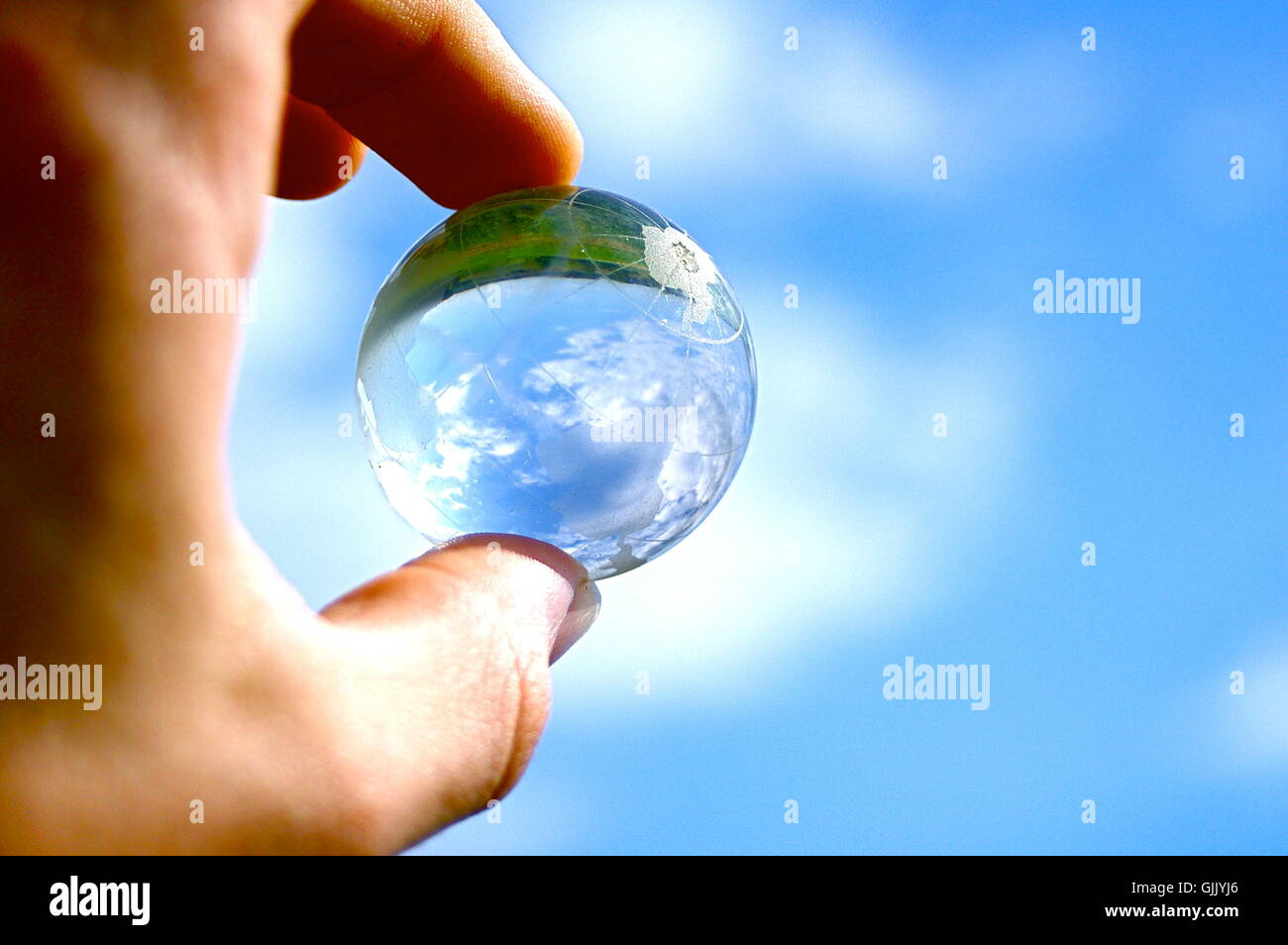 hand finger glass ball Stock Photo - Alamy