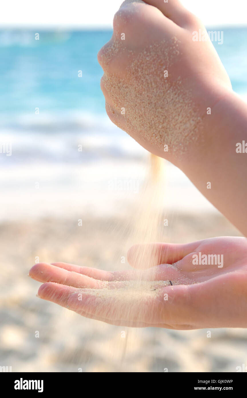 Hand sifting hi-res stock photography and images - Alamy