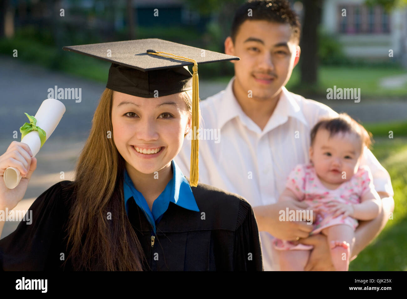 Happy Smiling Asian Family At Graduation Ceremony Stock Photos & Happy ...