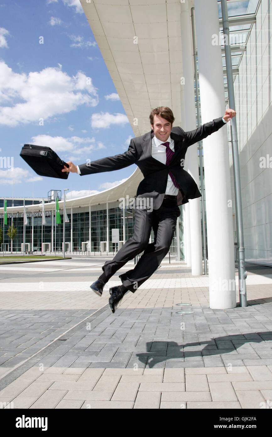 briefcase spring bouncing Stock Photo - Alamy