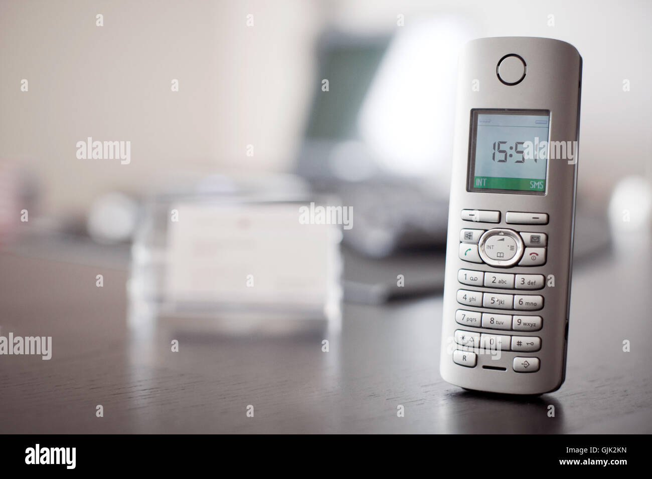 phone on desk Stock Photo - Alamy