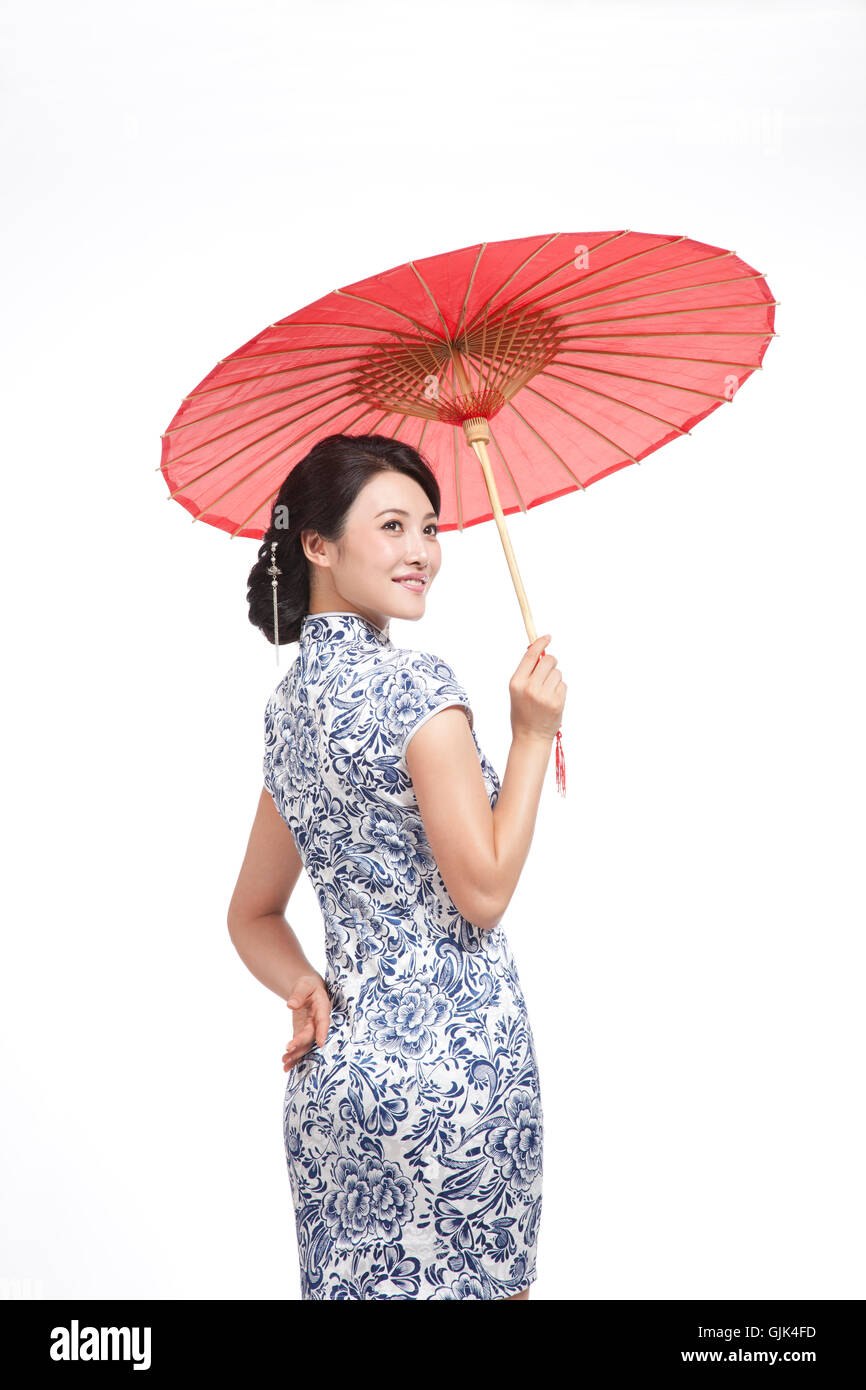 Dressed in traditional Chinese costumes studio shot young woman and ...