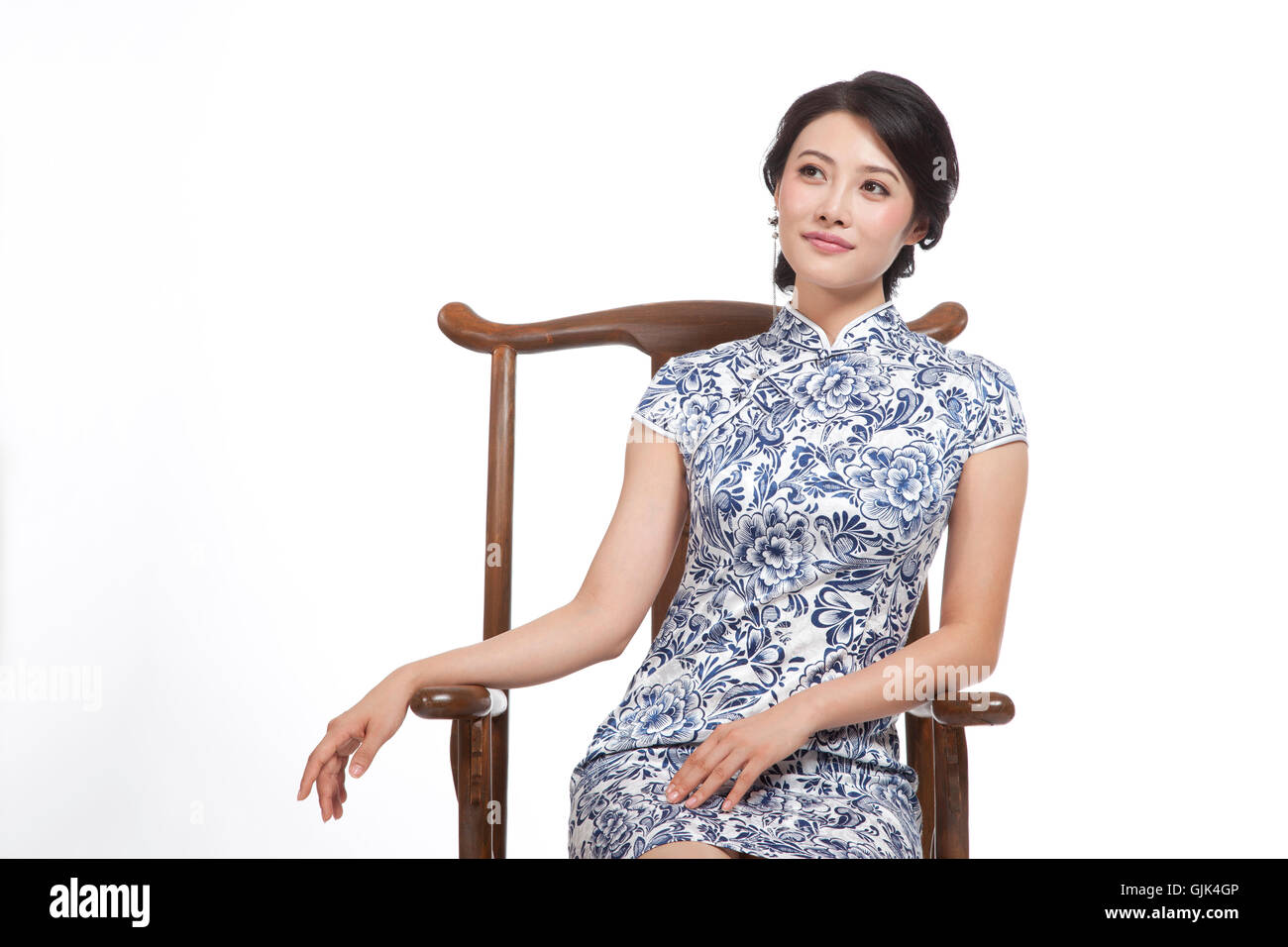 Dressed in traditional Chinese costumes studio shot young Chinese woman ...