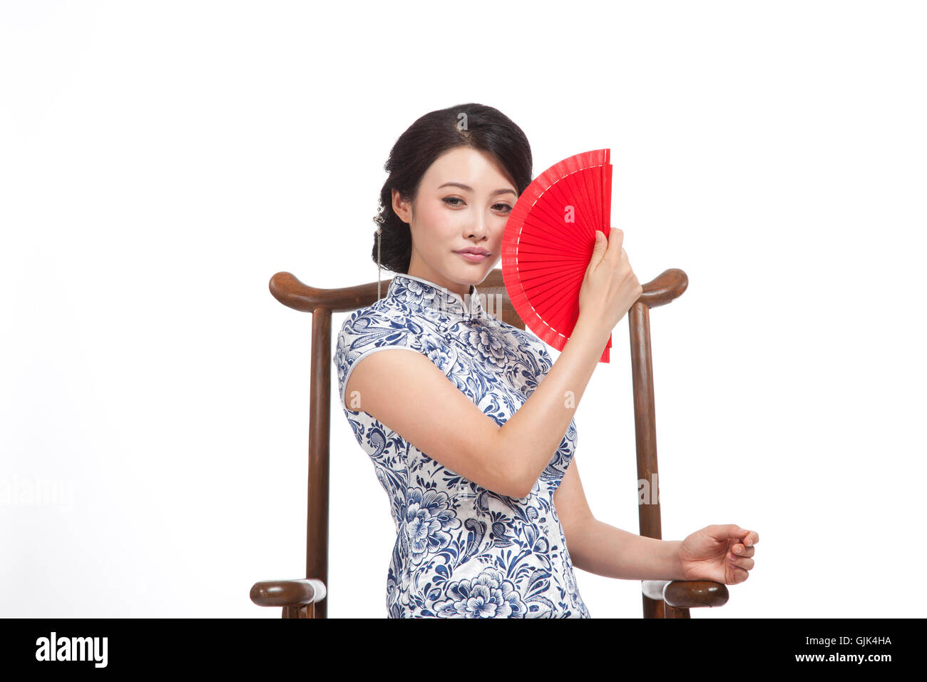 Dressed in traditional Chinese costumes studio shot young Chinese woman ...