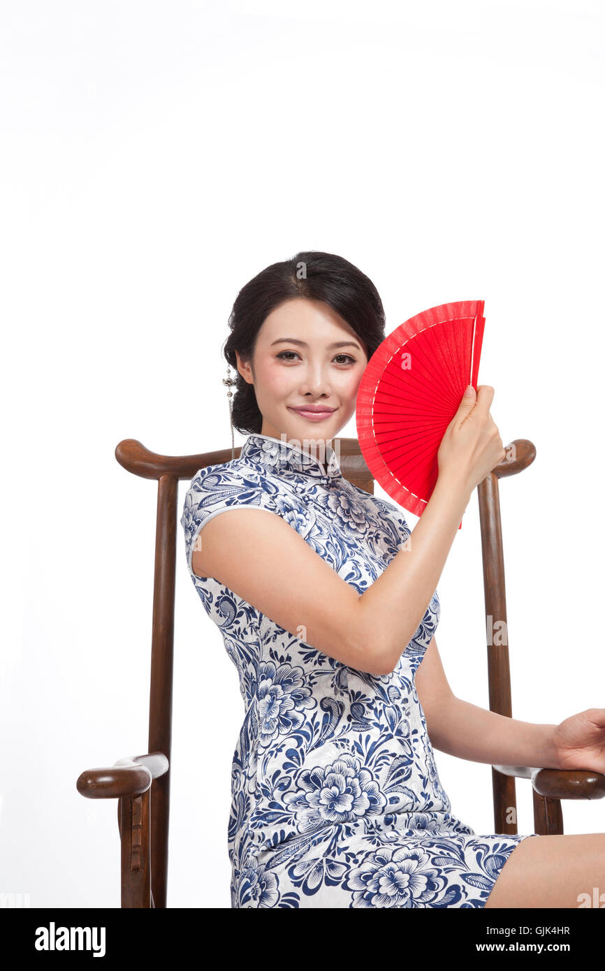 Dressed in traditional Chinese costumes studio shot young Chinese woman ...