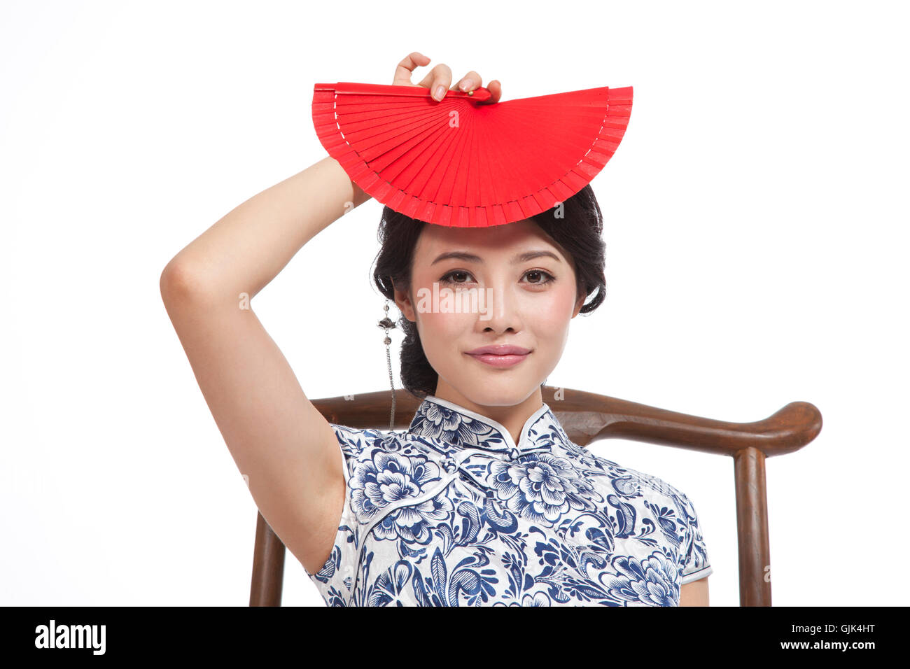 Dressed in traditional Chinese costumes studio shot young Chinese woman ...