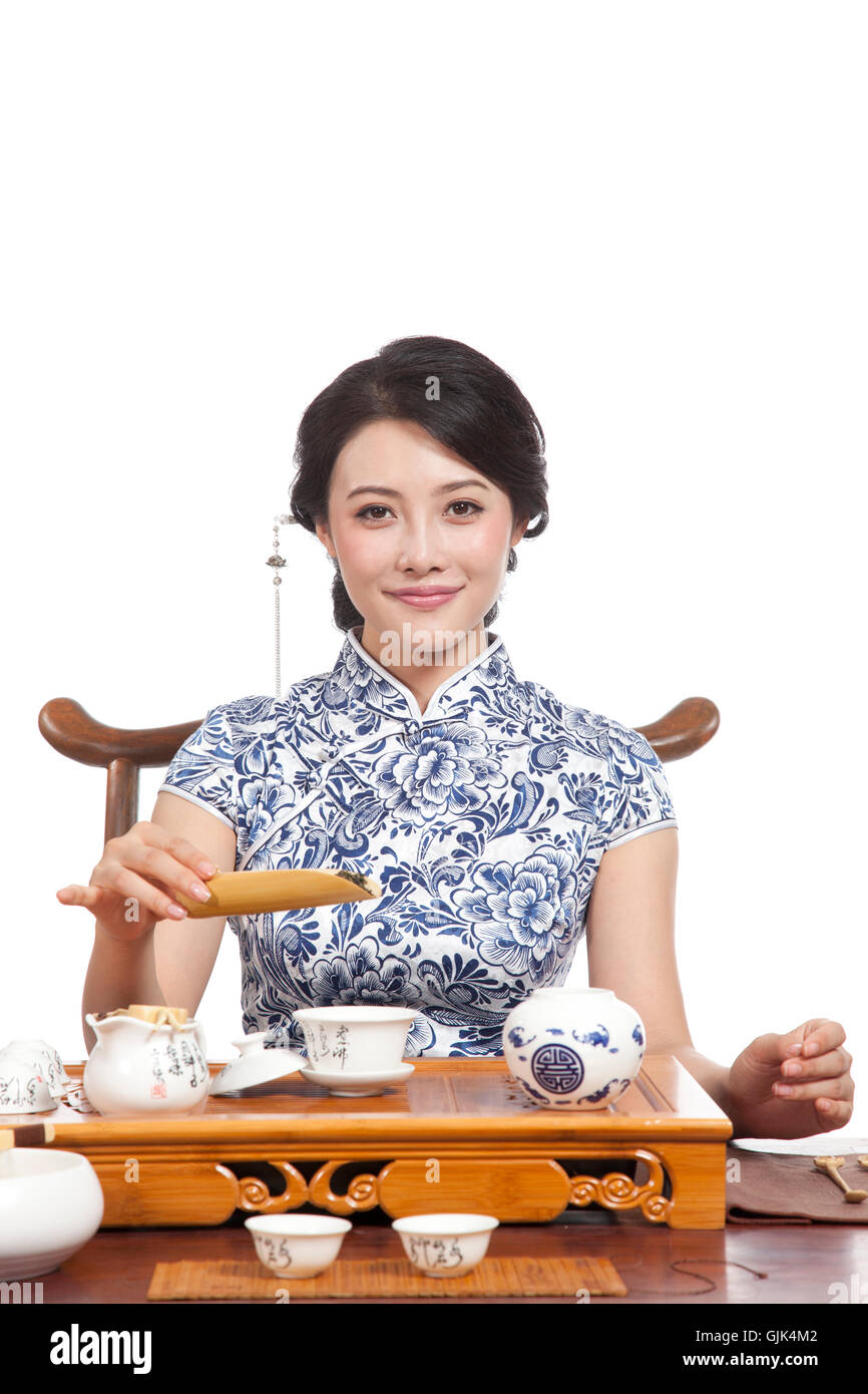 Dressed in traditional Chinese costumes studio shot young woman show ...