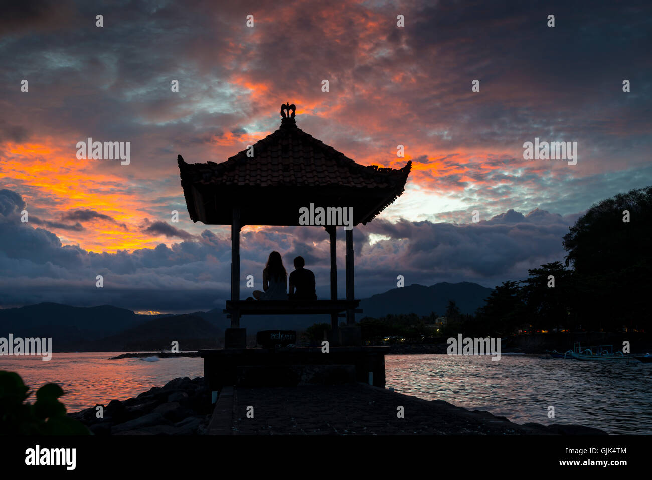 Sunset behind pagoda in Bali Stock Photo - Alamy