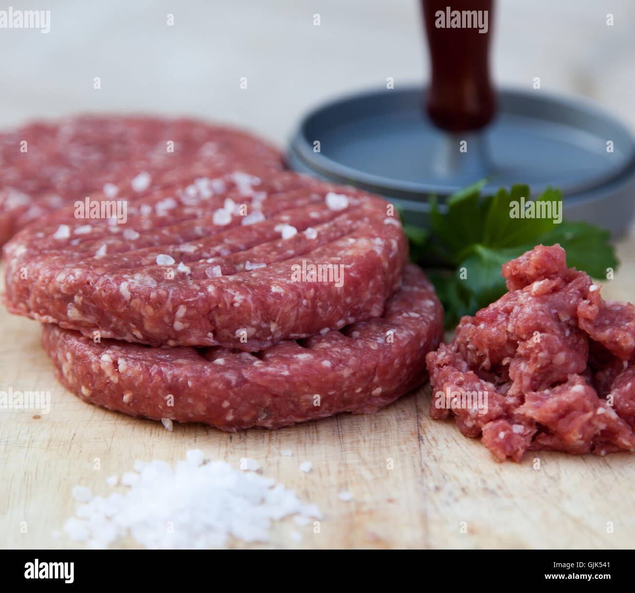 raw beef burger Stock Photo - Alamy