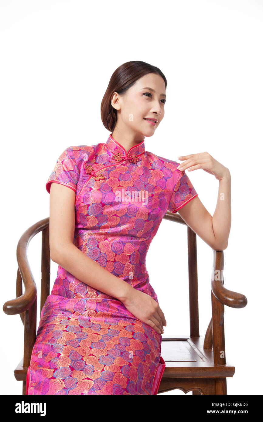 Dressed in traditional Chinese costumes studio shot young Chinese woman ...