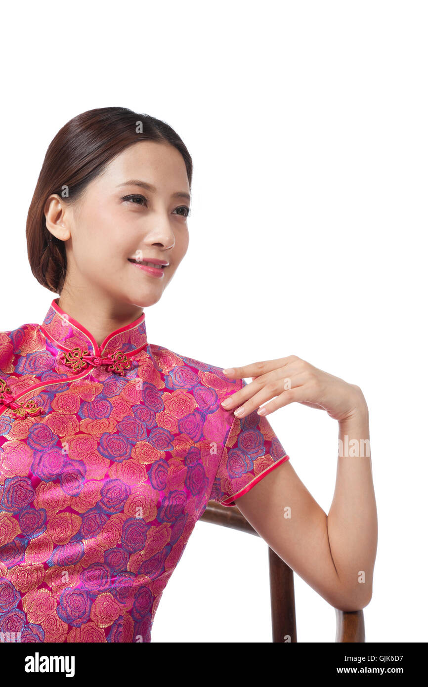 Dressed in traditional Chinese costumes studio shot young Chinese woman ...