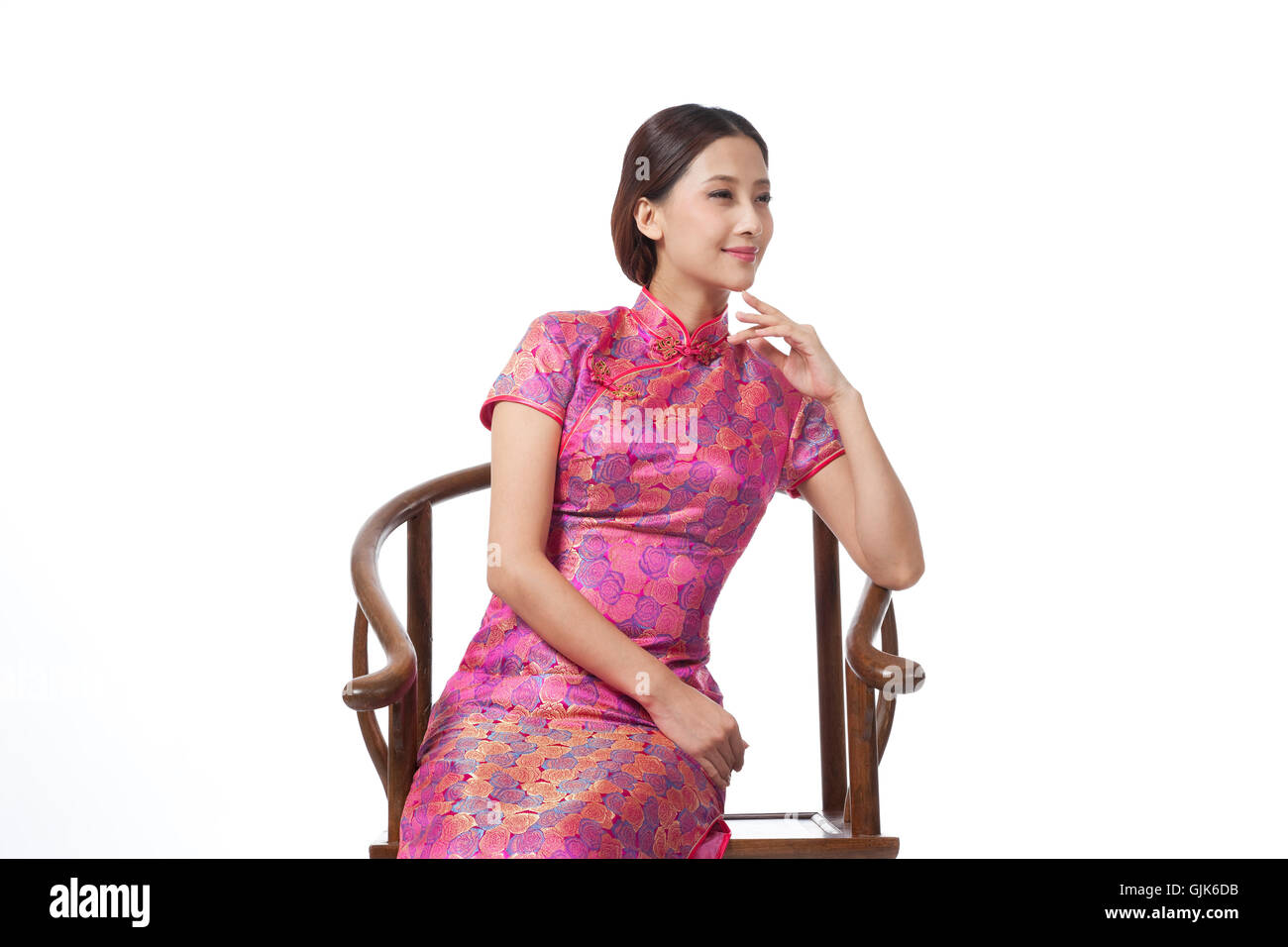 Dressed in traditional Chinese costumes studio shot young Chinese woman ...