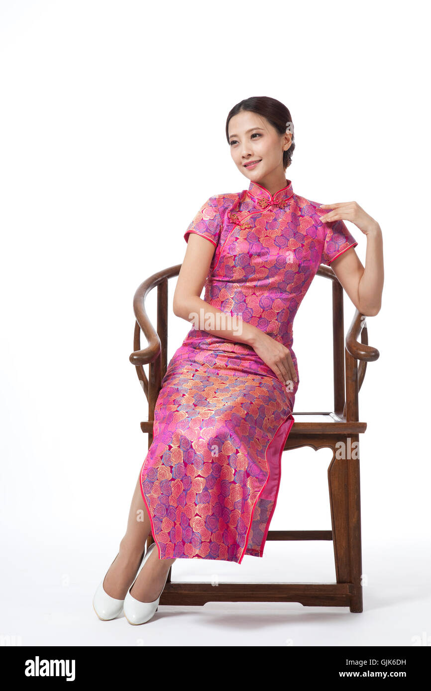 Dressed in traditional Chinese costumes studio shot young Chinese woman ...