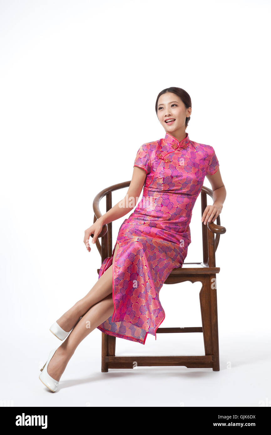 Dressed in traditional Chinese costumes studio shot young Chinese woman ...