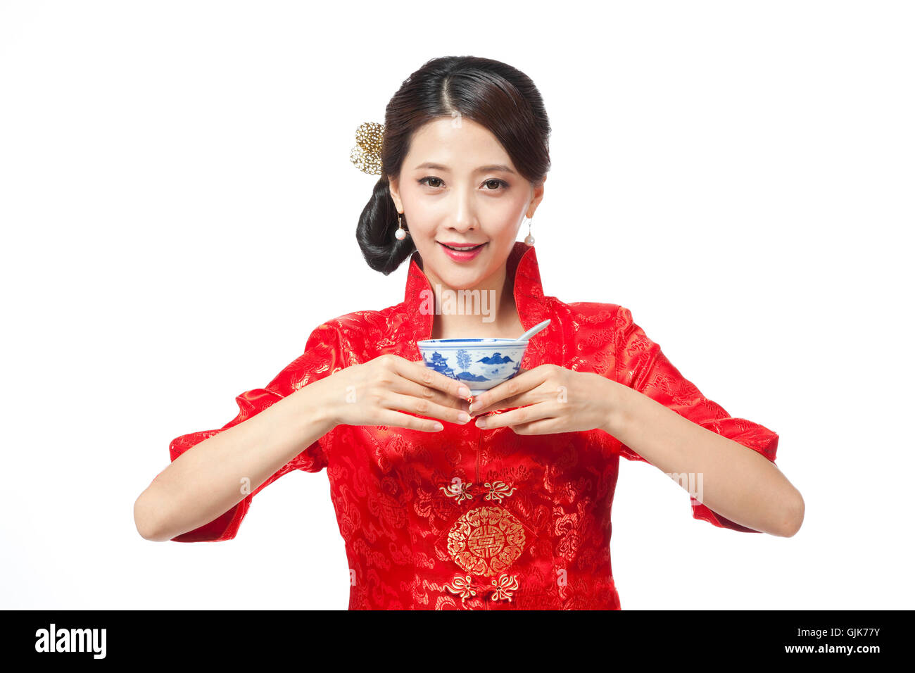 Dressed in traditional Chinese costumes studio shot young woman tea ...
