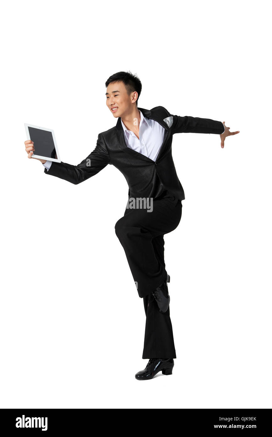 Take your tablet shed clapping dancing young men Stock Photo - Alamy
