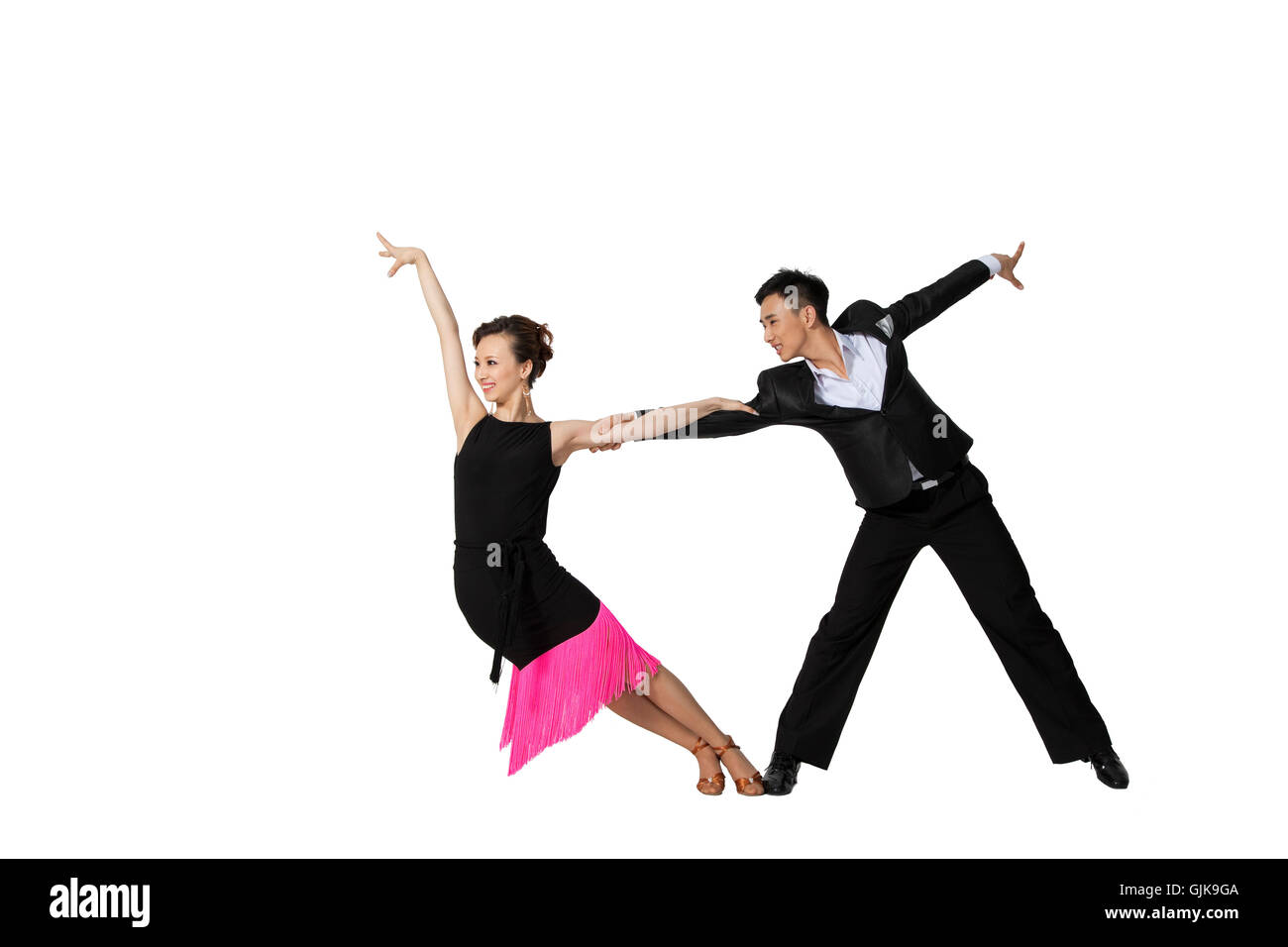 Studio shot young man dancing Stock Photo - Alamy