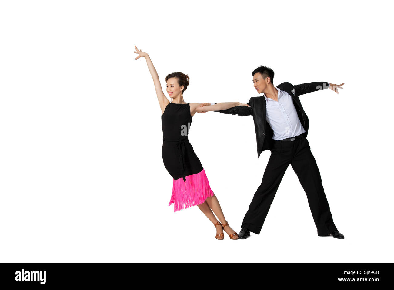 Studio shot young man dancing Stock Photo - Alamy