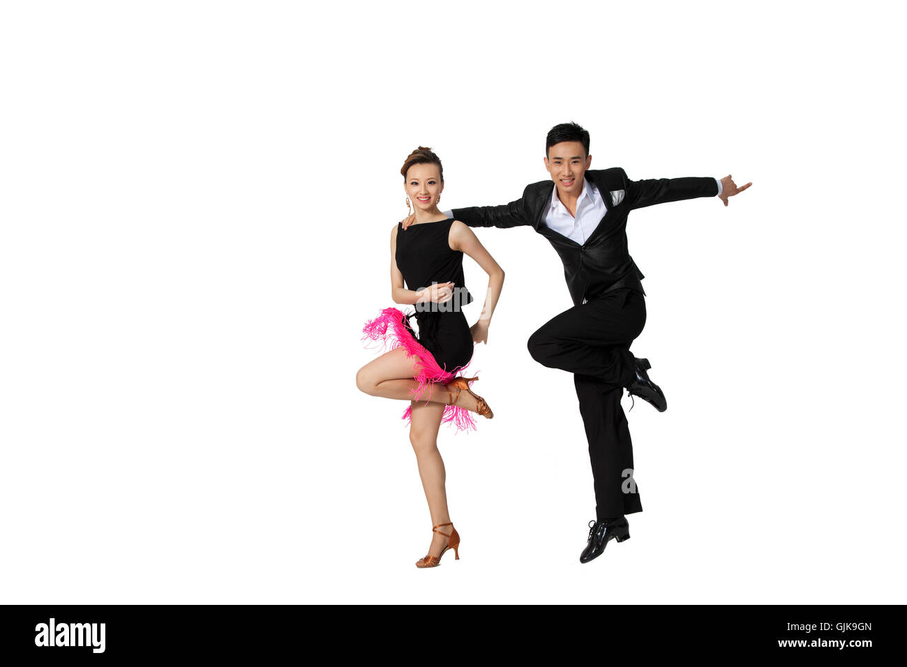 Studio shot young man dancing Stock Photo - Alamy