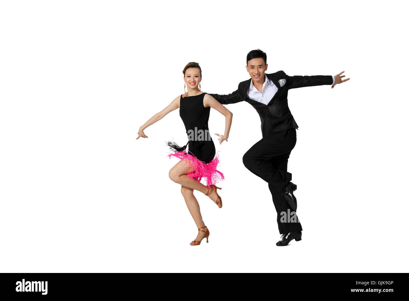 Studio shot young man dancing Stock Photo - Alamy