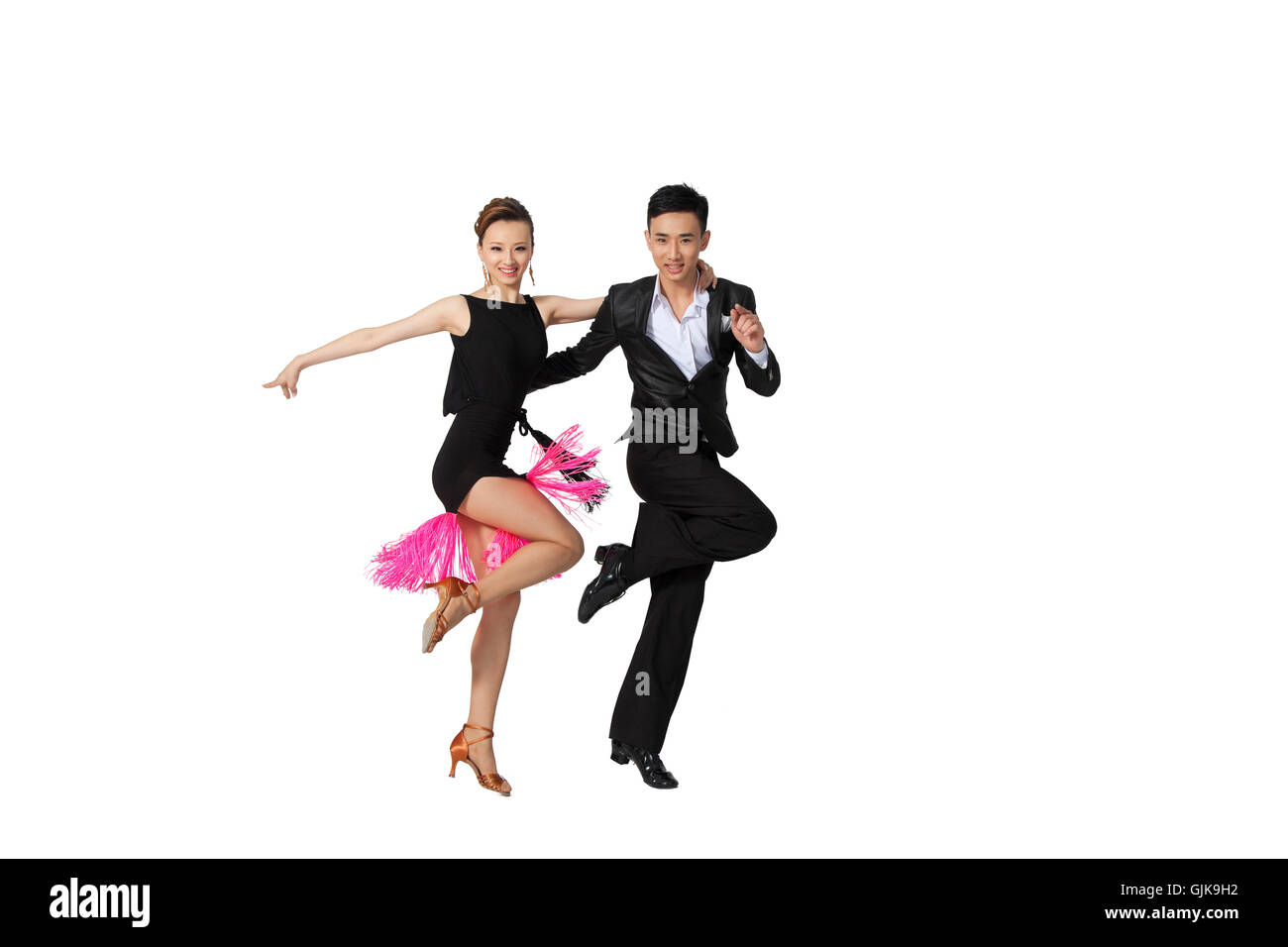 Studio shot young man dancing Stock Photo - Alamy