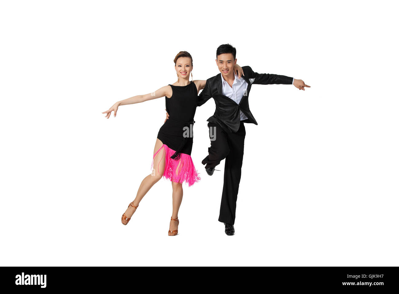 Studio shot young man dancing Stock Photo - Alamy