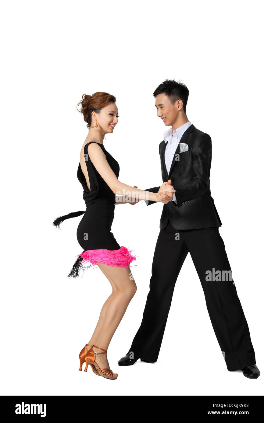 Studio shot young man dancing Stock Photo - Alamy