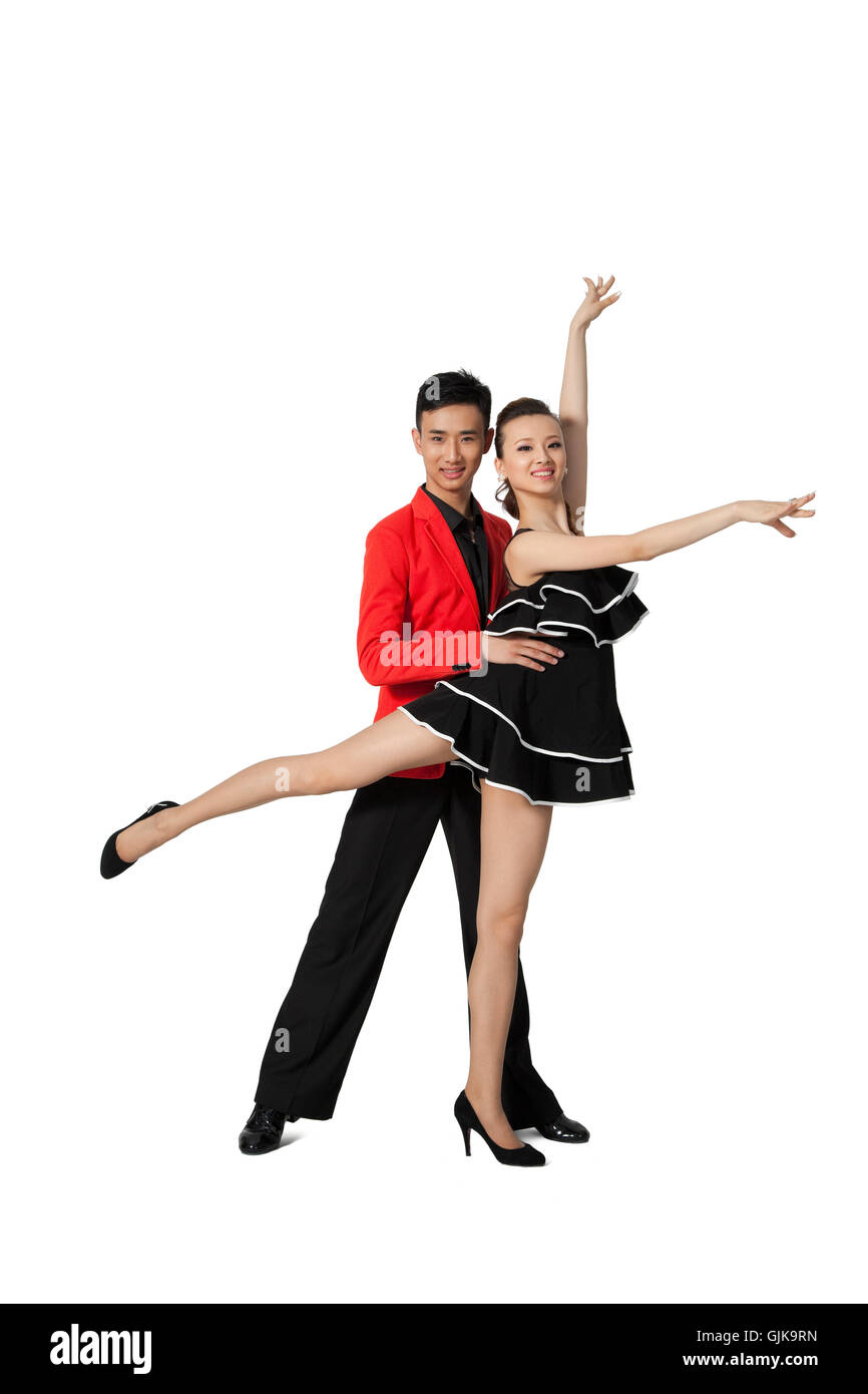 Studio shot young man dancing Stock Photo - Alamy