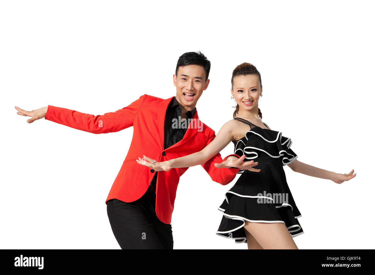 Studio shot young man dancing Stock Photo - Alamy