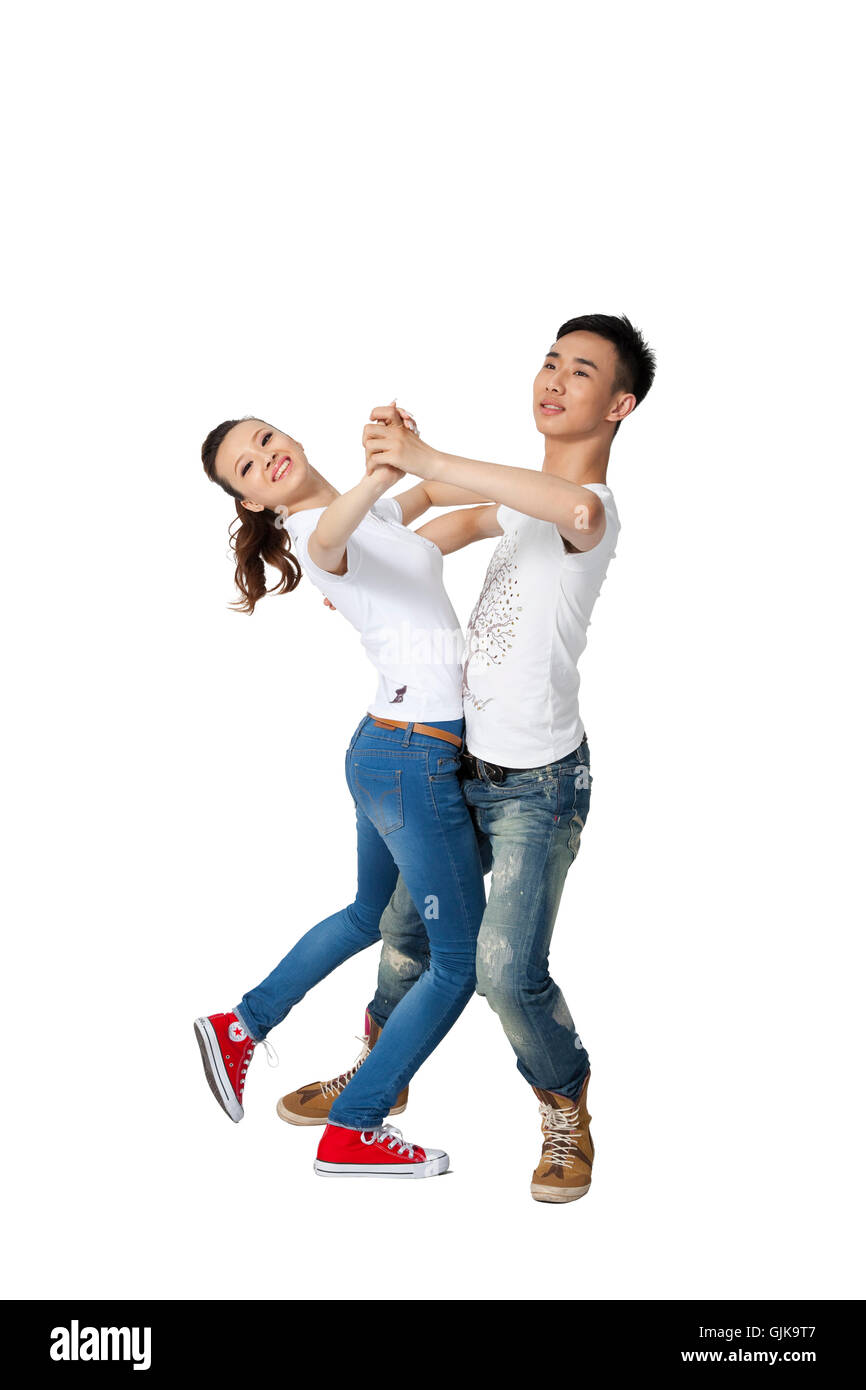 Studio shot young man dancing Stock Photo - Alamy