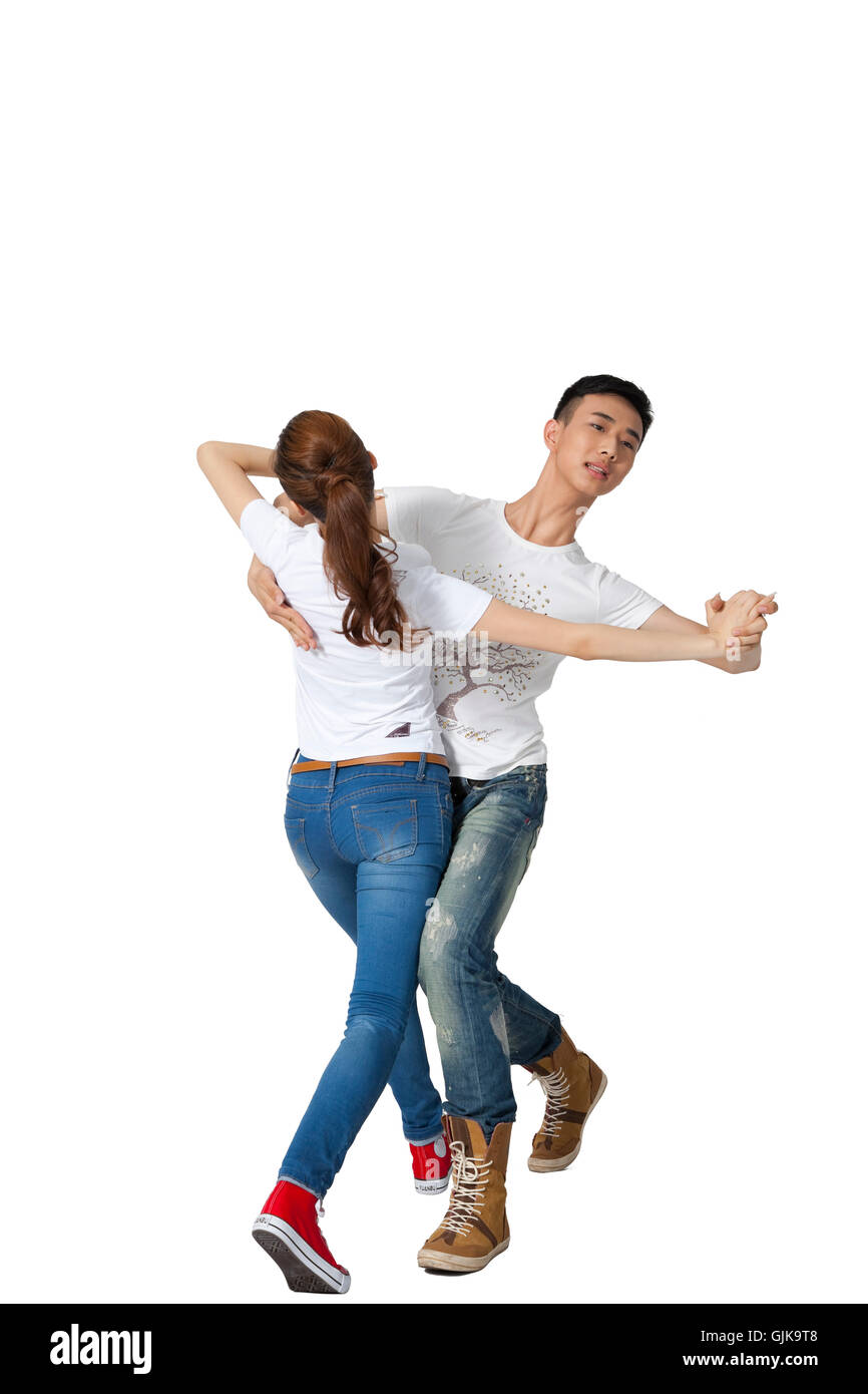 Studio shot young man dancing Stock Photo - Alamy