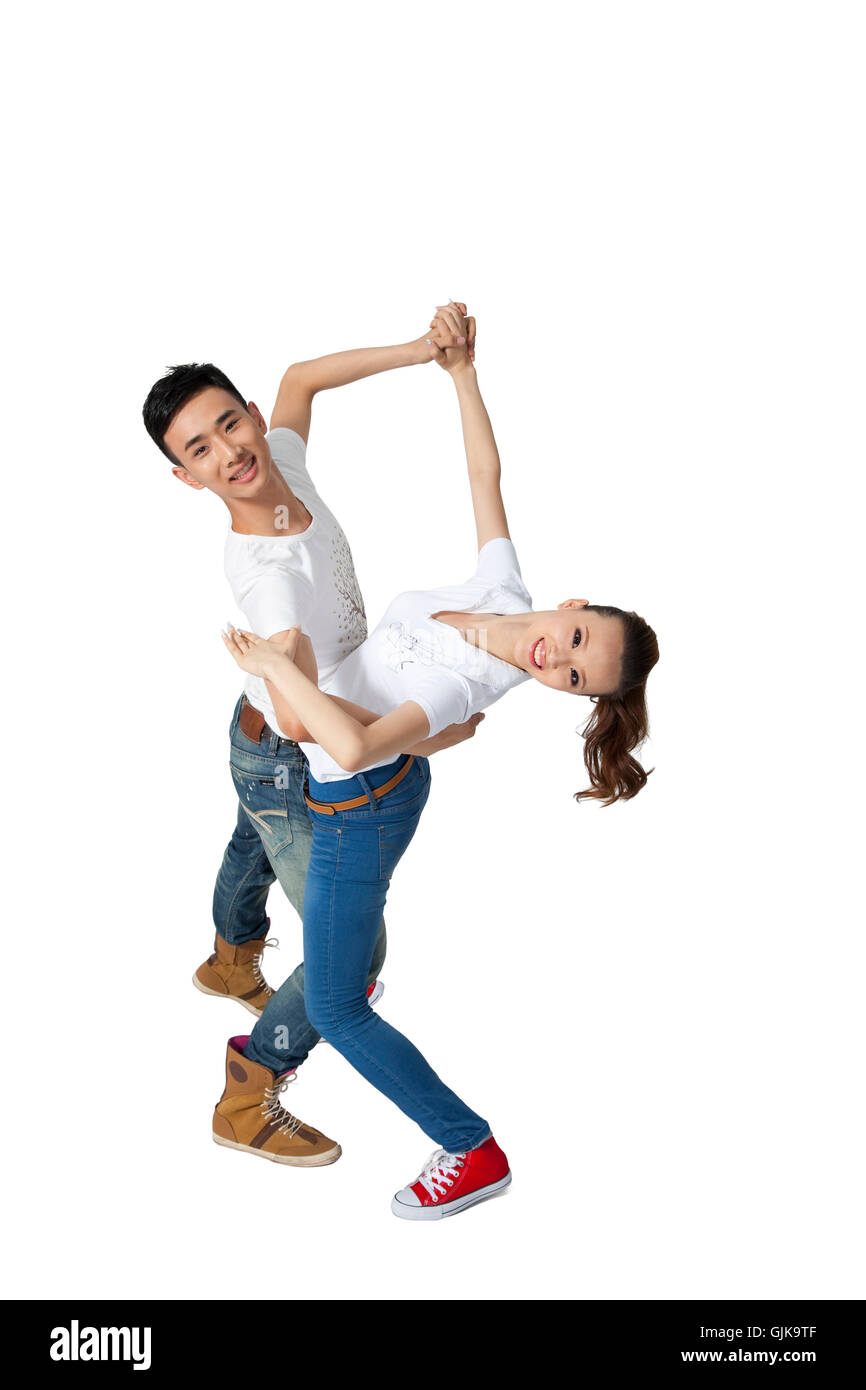 Studio shot young man dancing Stock Photo - Alamy