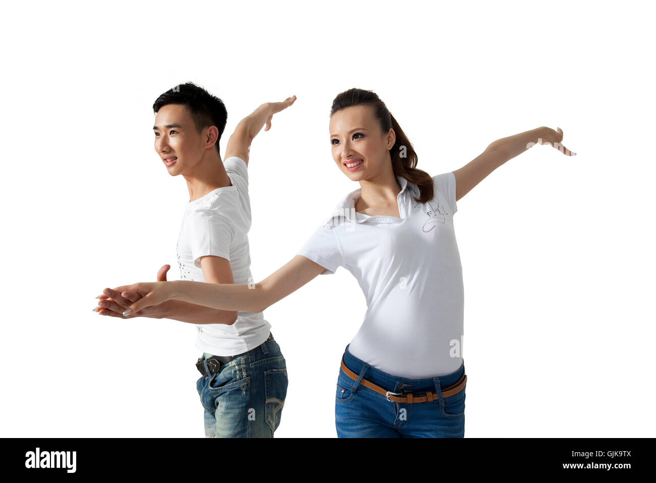 Studio shot young man dancing Stock Photo - Alamy