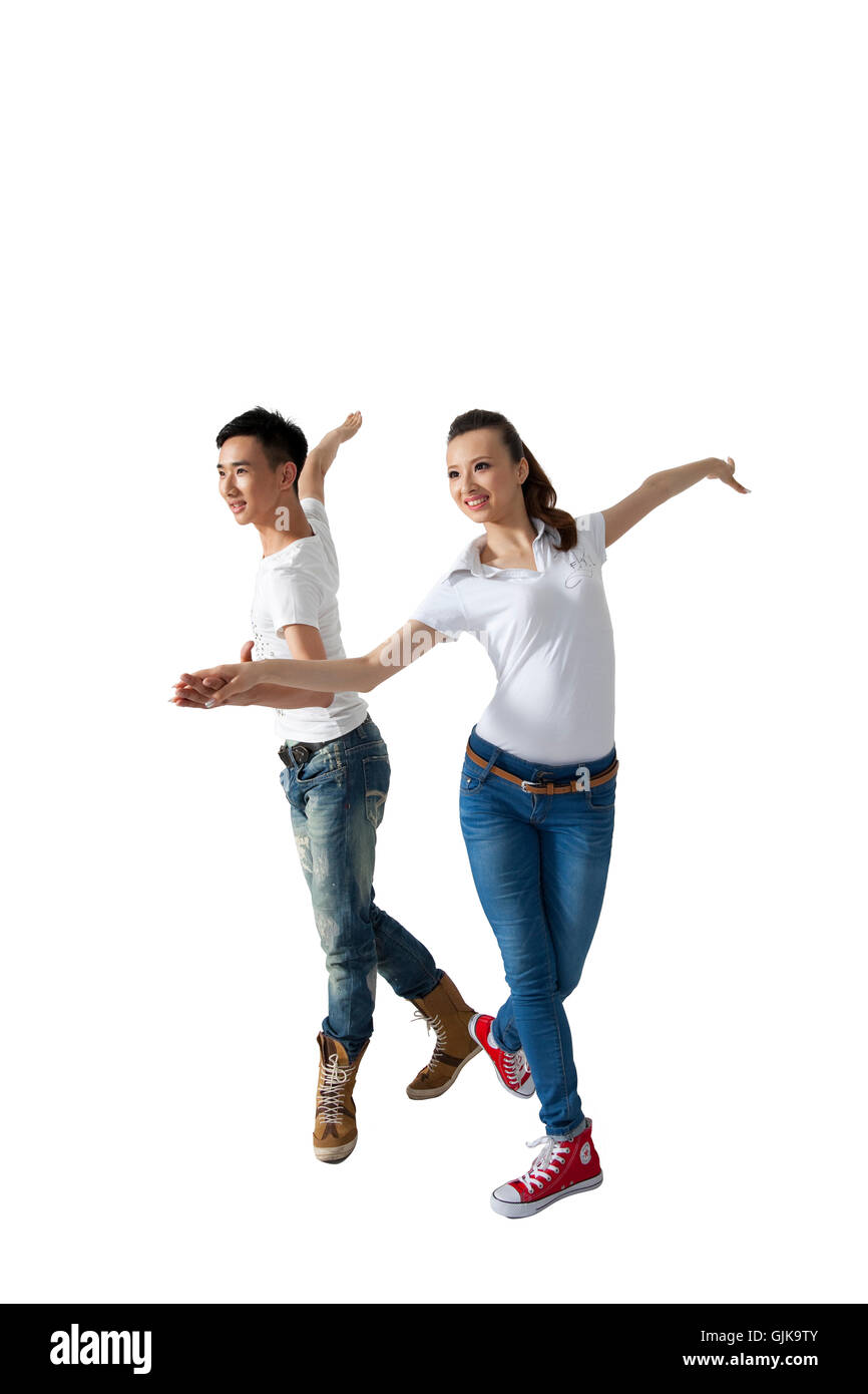 Studio shot young man dancing Stock Photo - Alamy