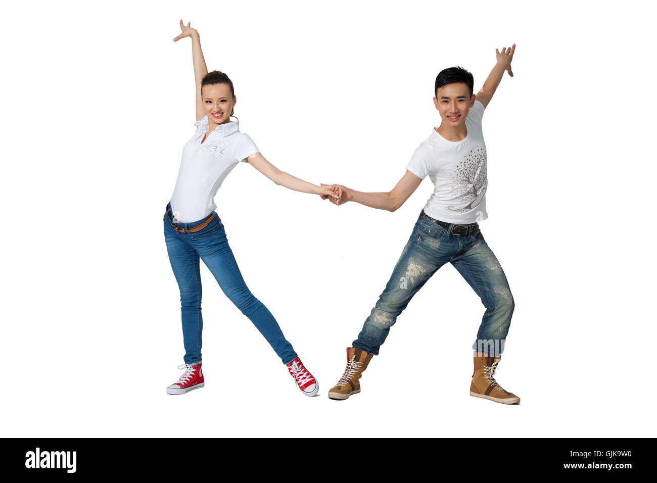 Studio shot young man dancing Stock Photo - Alamy