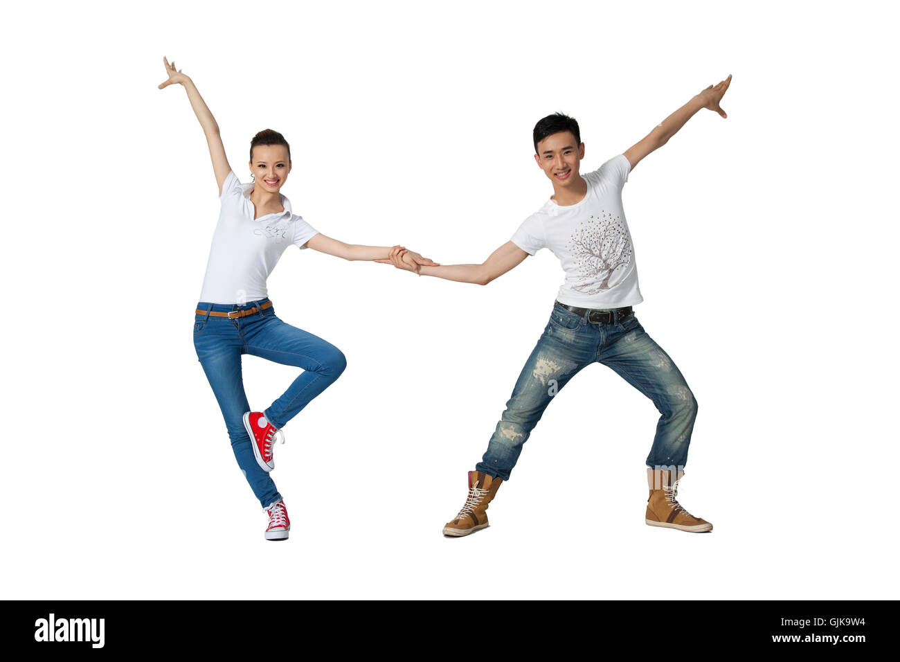 Studio shot young man dancing Stock Photo - Alamy
