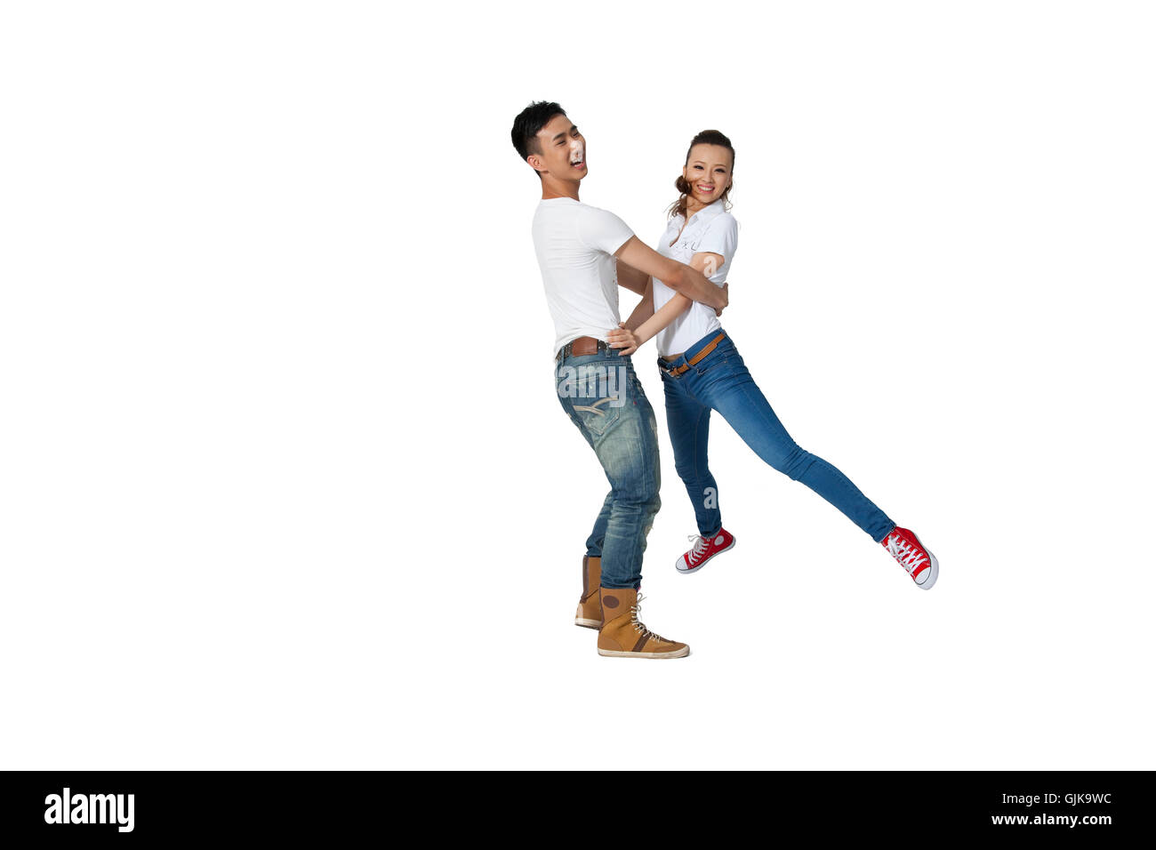 Studio shot young man dancing Stock Photo - Alamy