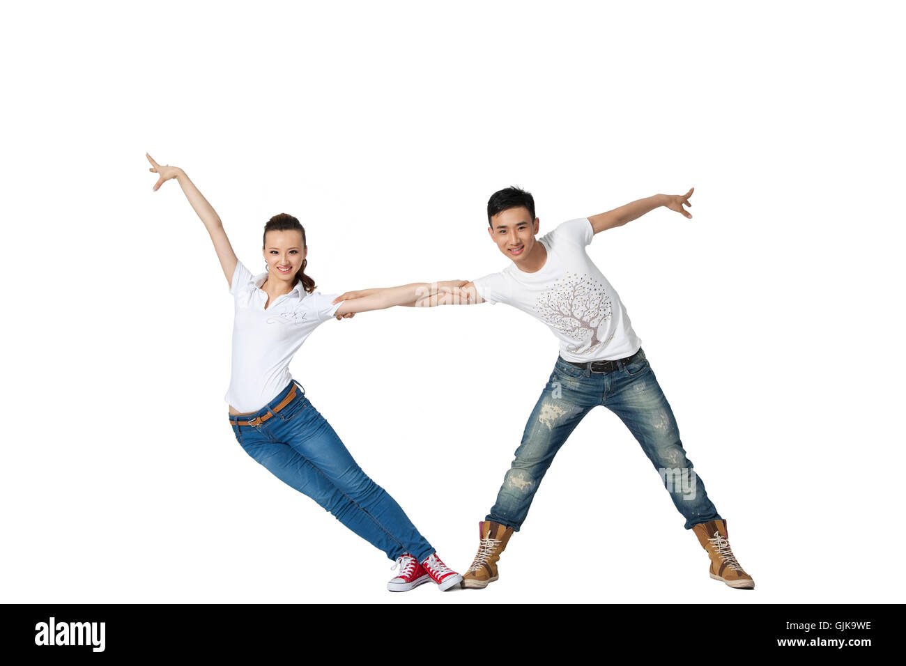 Studio shot young man dancing Stock Photo - Alamy