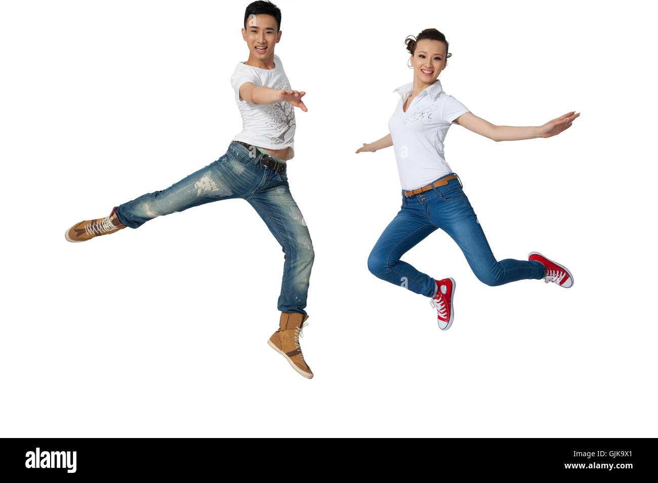 Studio shot young man dancing Stock Photo - Alamy
