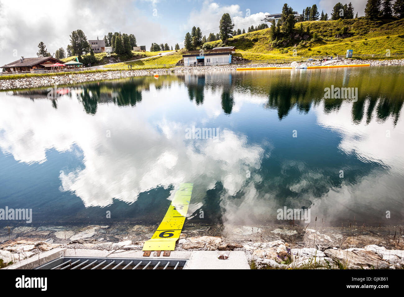 Yellow sign with numbers for measuring water level in a lake Stock ...