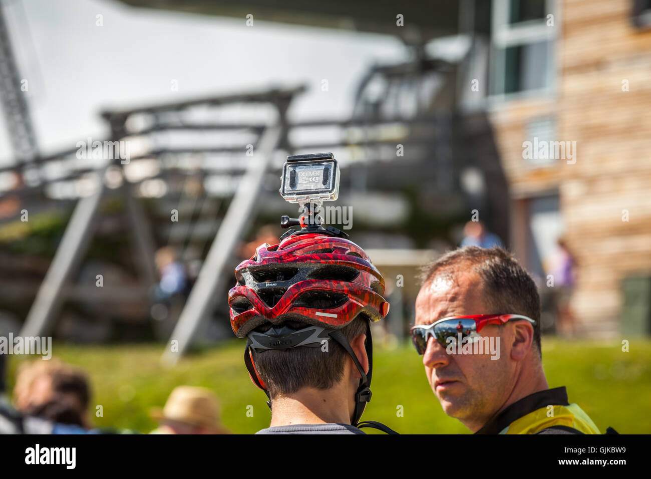 Young boy with an action camera mount on the helmet Stock Photo - Alamy