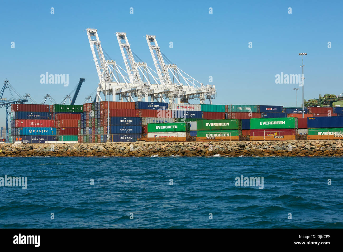 Raised Gantry Cranes And Stacked Shipping Containers On Pier J At The ...
