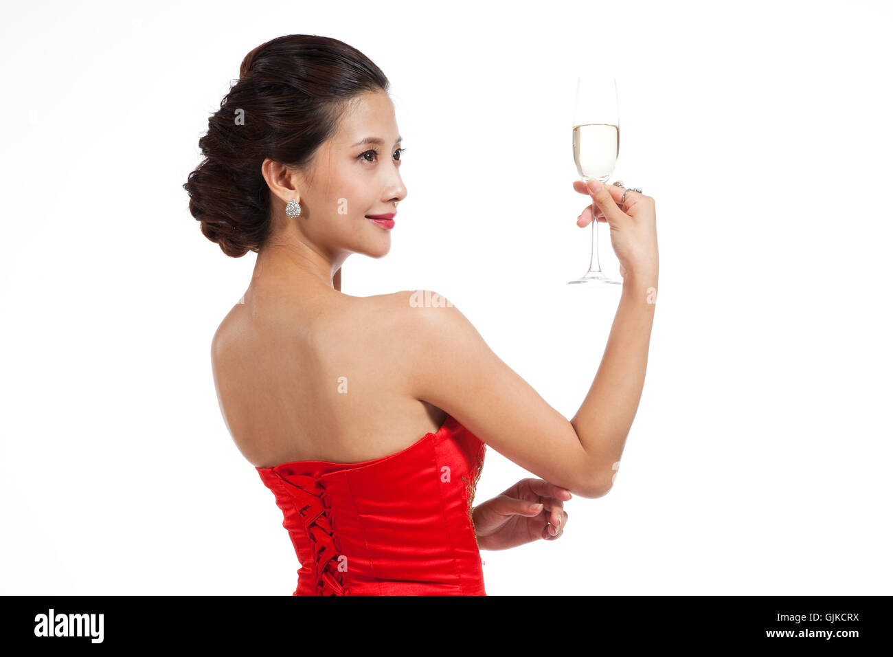 Studio shot Young woman dressed in traditional Chinese costumes back ...