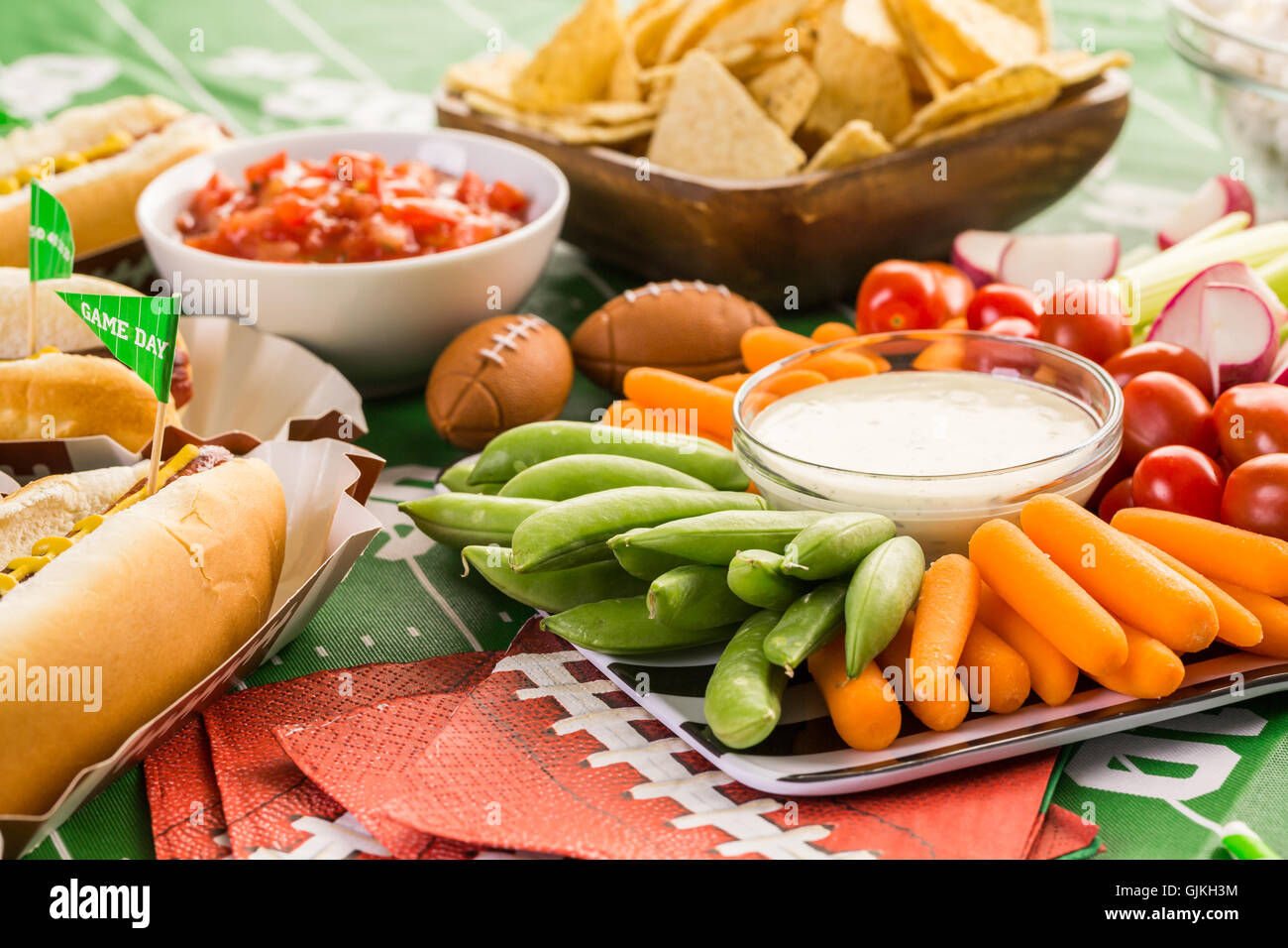 Appetizers on the table for the football party Stock Photo - Alamy