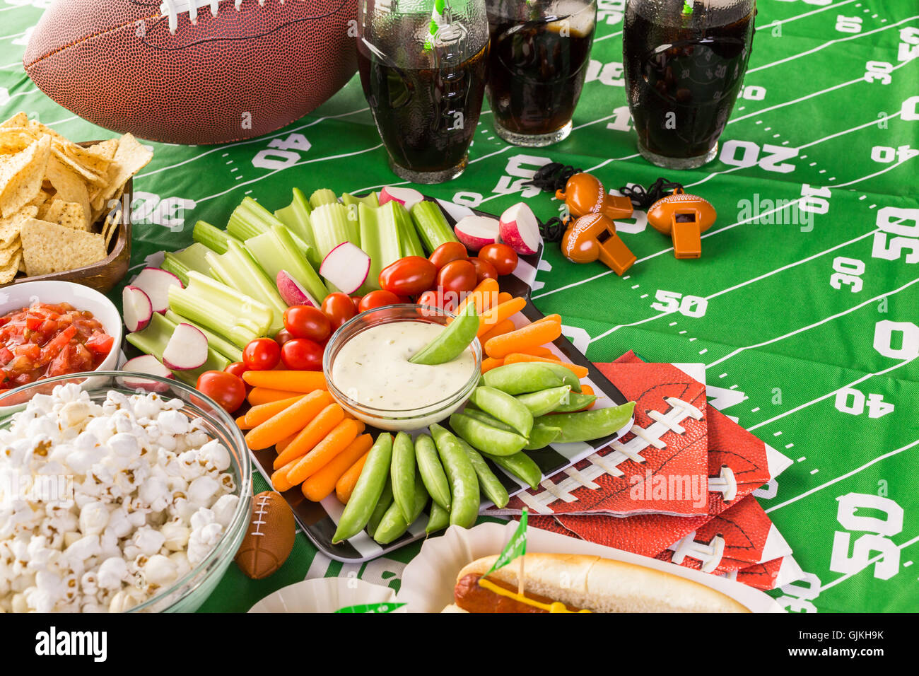 Appetizers on the table for the football party Stock Photo - Alamy