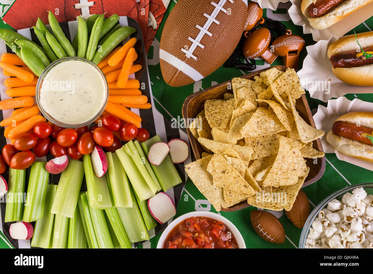 Appetizers on the table for the football party Stock Photo - Alamy