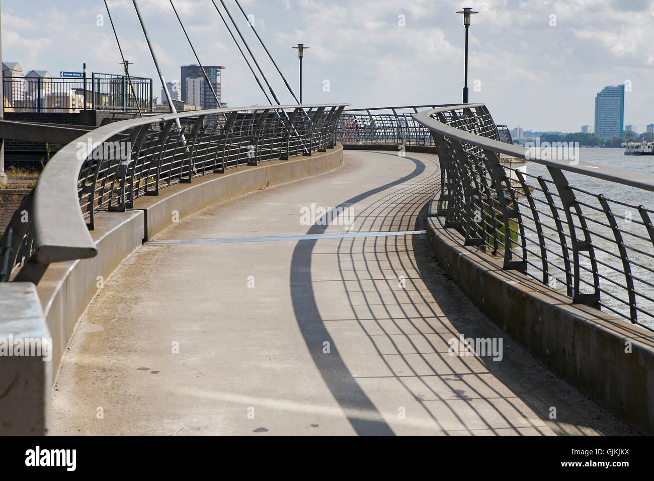 curve bridge over the canal near Canary Wharf in London Stock Photo - Alamy
